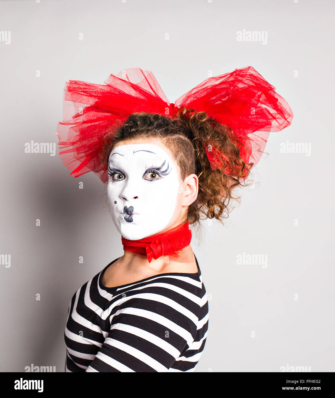 A woman clown mime posing in studio, april fools day concept Stock ...