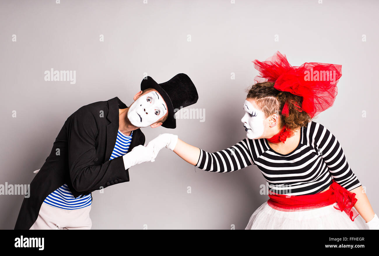 portrait of mimes in love. man kissing womans hand Stock Photo - Alamy