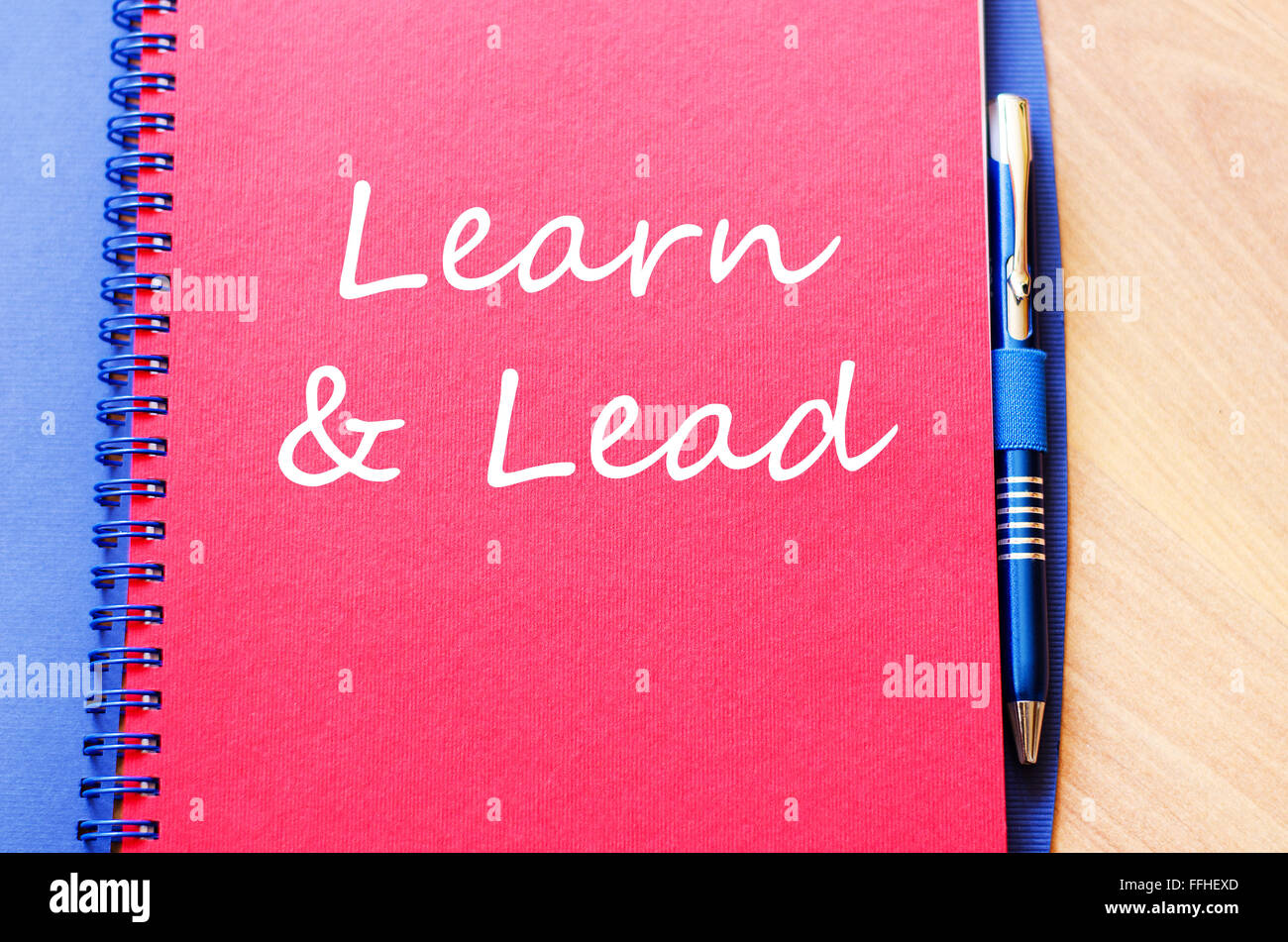 Learn & Lead text concept write on notebook Stock Photo - Alamy