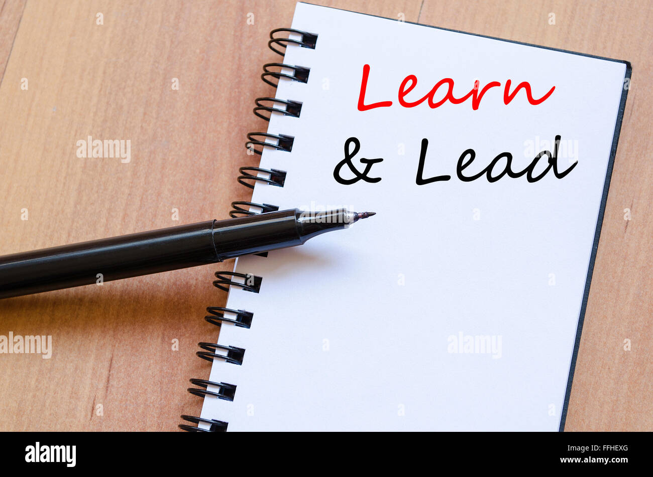 Learn & Lead text concept write on notebook Stock Photo - Alamy