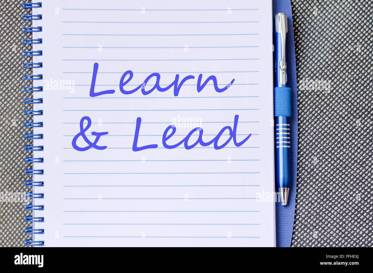 Learn & Lead text concept write on notebook Stock Photo - Alamy