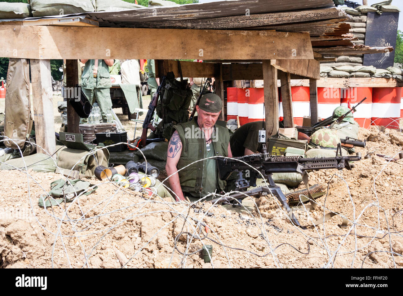 Vietnam war re-enactment. Exterior of US timber roofed Command bunker ...