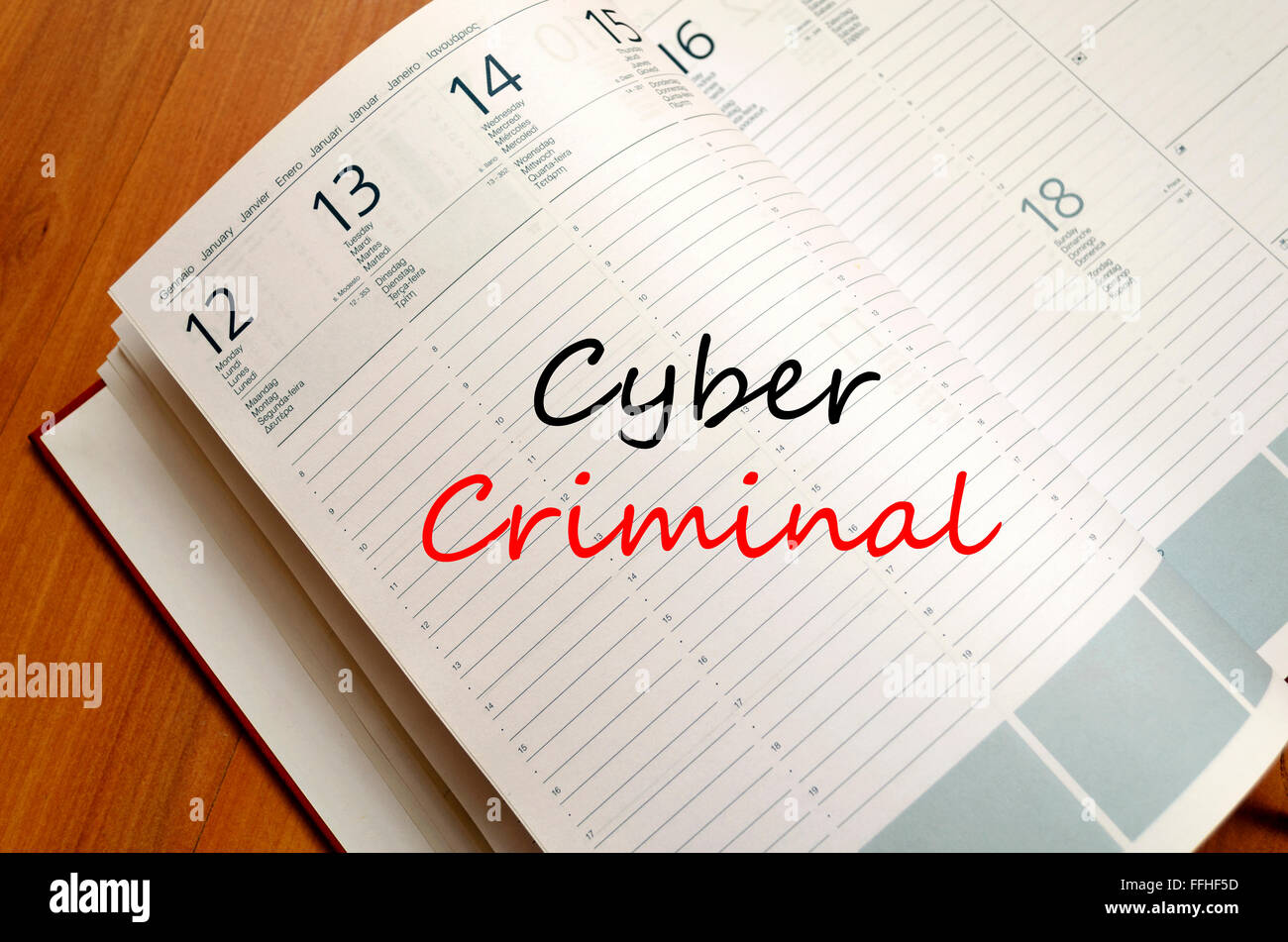 Cyber criminal text concept write on notebook Stock Photo - Alamy