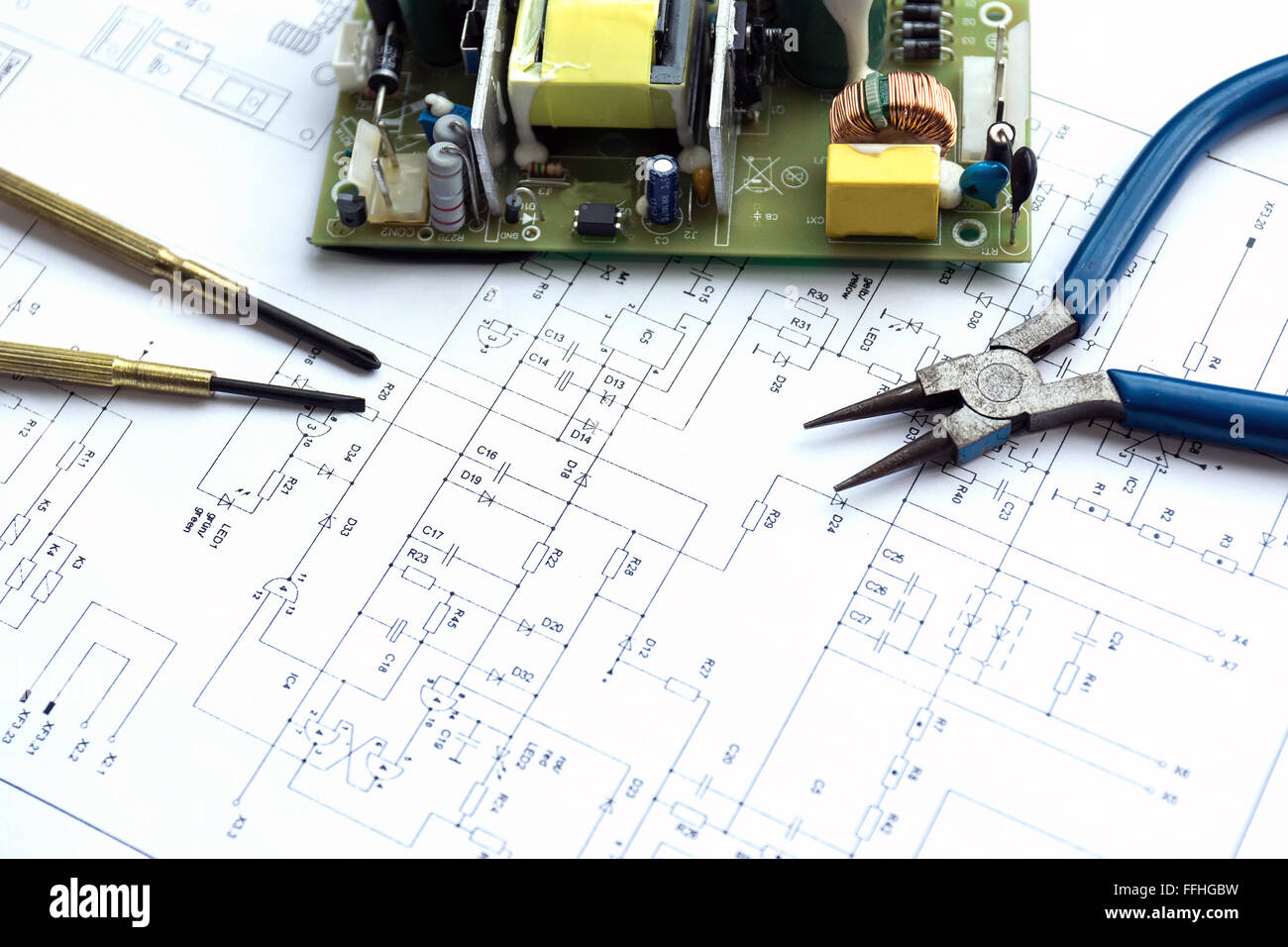 Printed circuit board with electrical component and precision tools ...