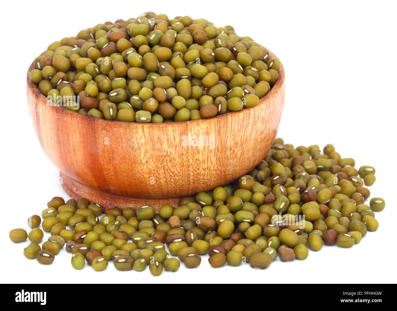 Mung bean in wooden bowl over white background Stock Photo - Alamy