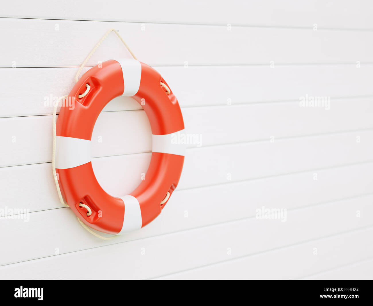 Lifebuoy on a wall background Stock Photo - Alamy