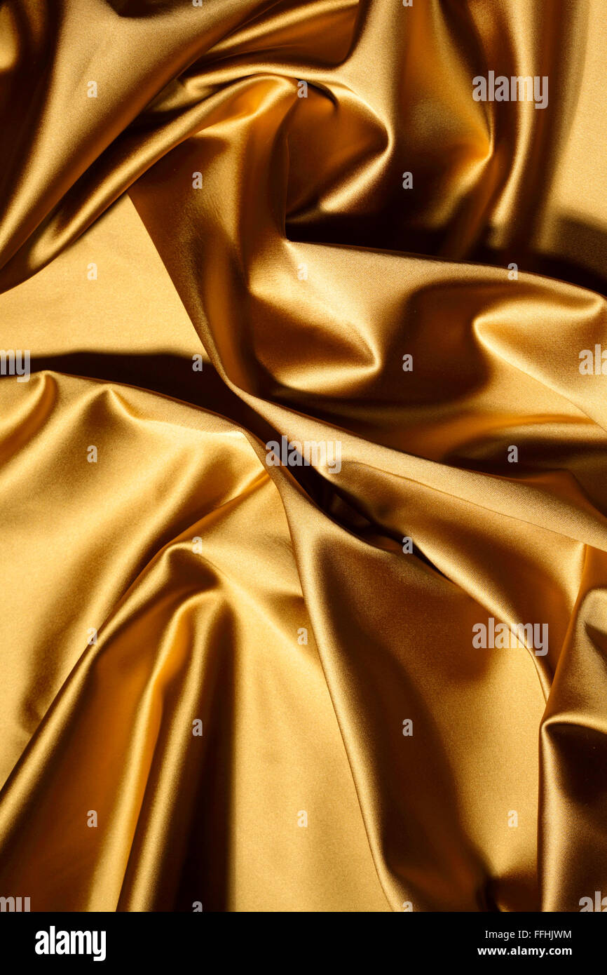 gold textile background close up Stock Photo - Alamy