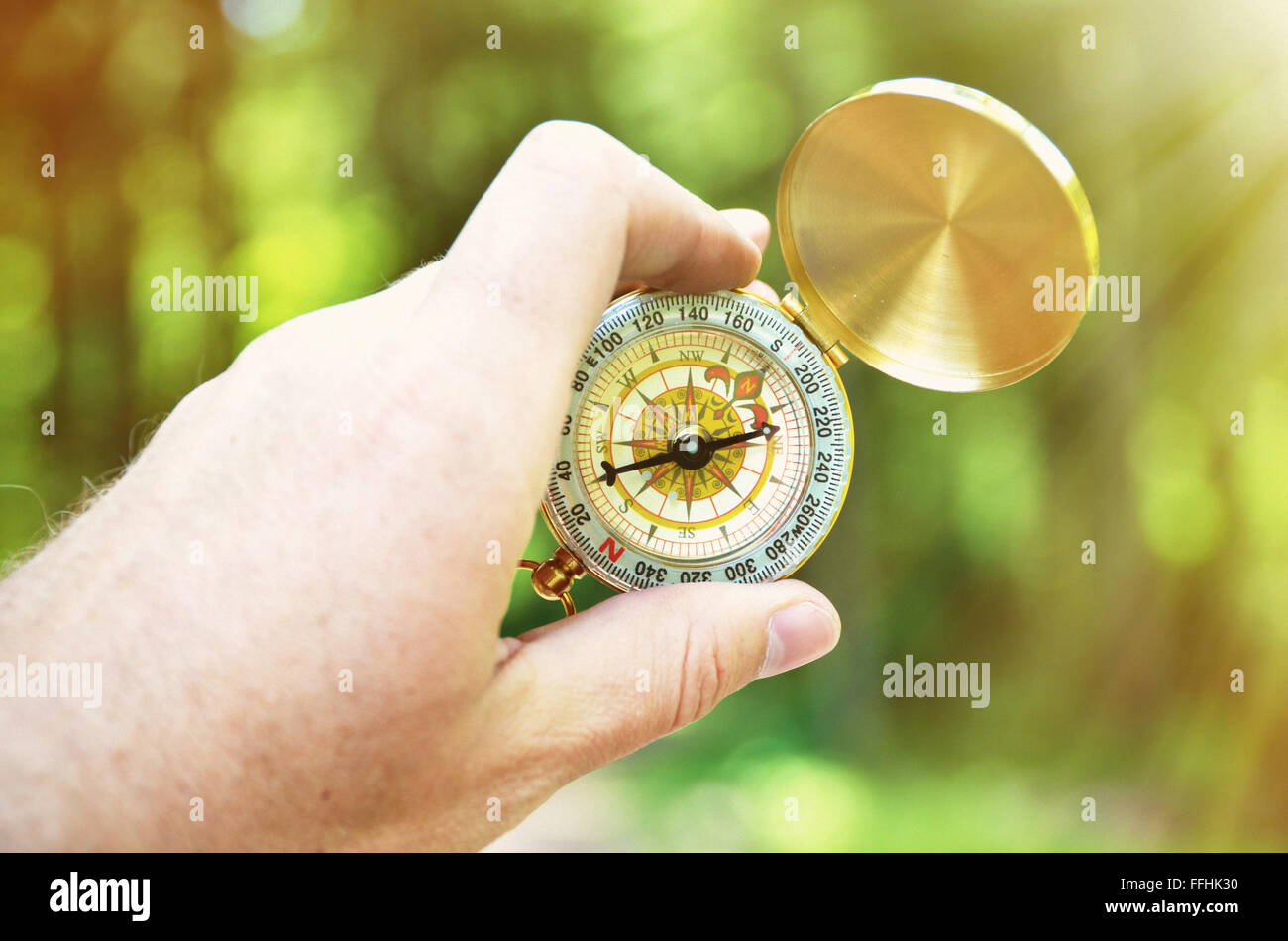 Compass in the hand Stock Photo - Alamy