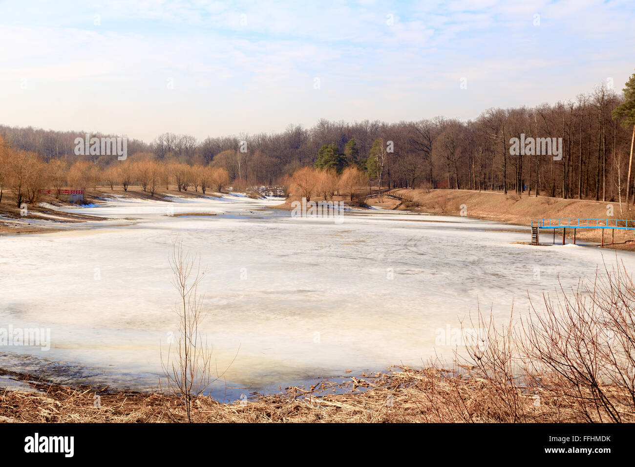 The pond under ice Stock Photo - Alamy