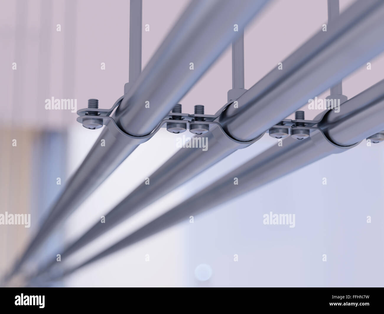 Metal pipes suspended to the ceiling closeup Stock Photo - Alamy