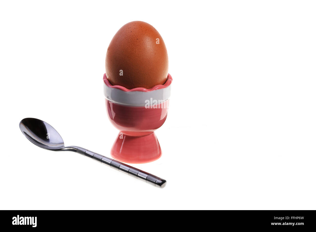 Spoon in egg hi-res stock photography and images - Alamy