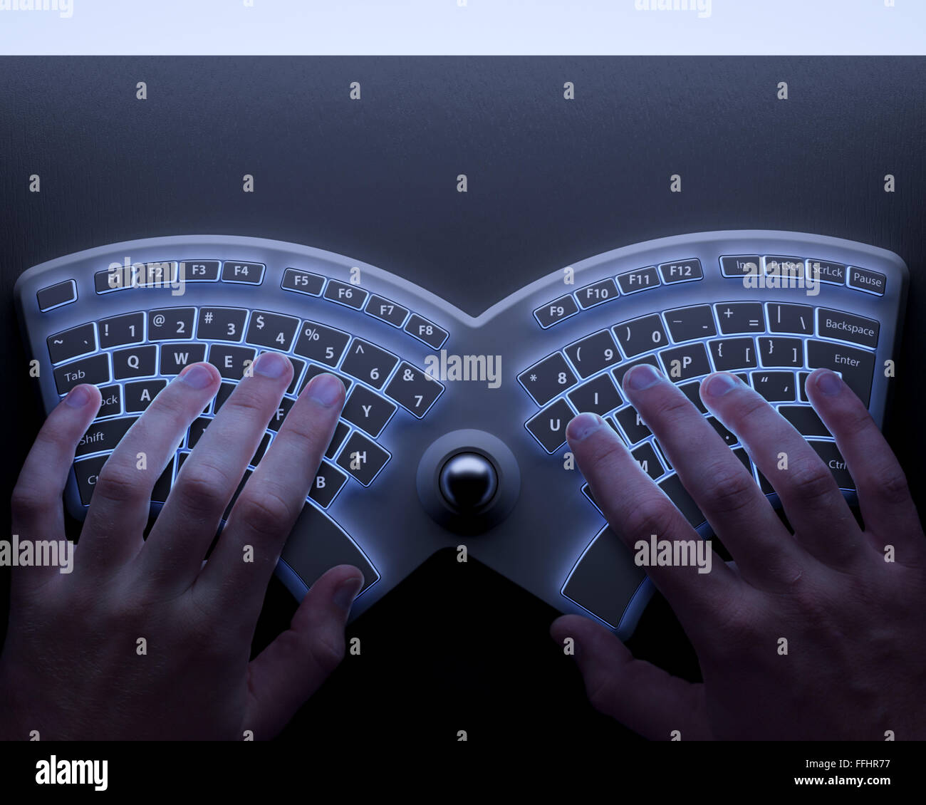 Human hands with conceptual ergonomic keyboard Stock Photo - Alamy