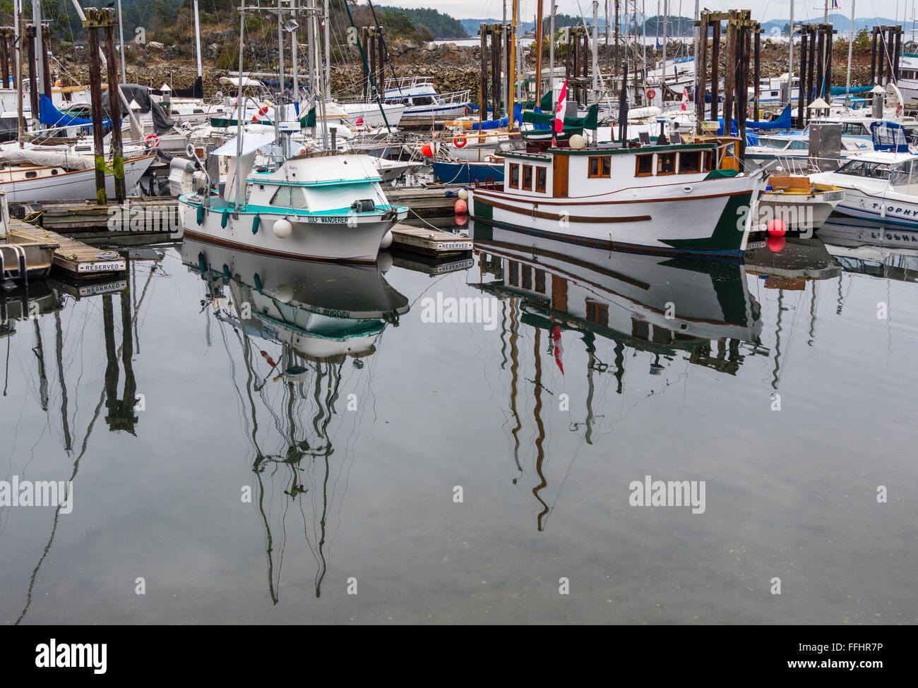 Small boats moored at Ganges Harbour marina, Salt Spring Island, BC ...