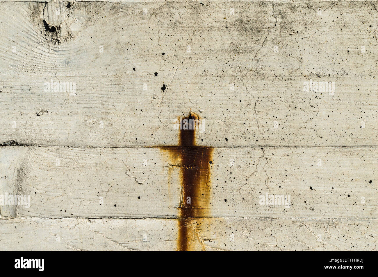 Rust in the wall Stock Photo - Alamy