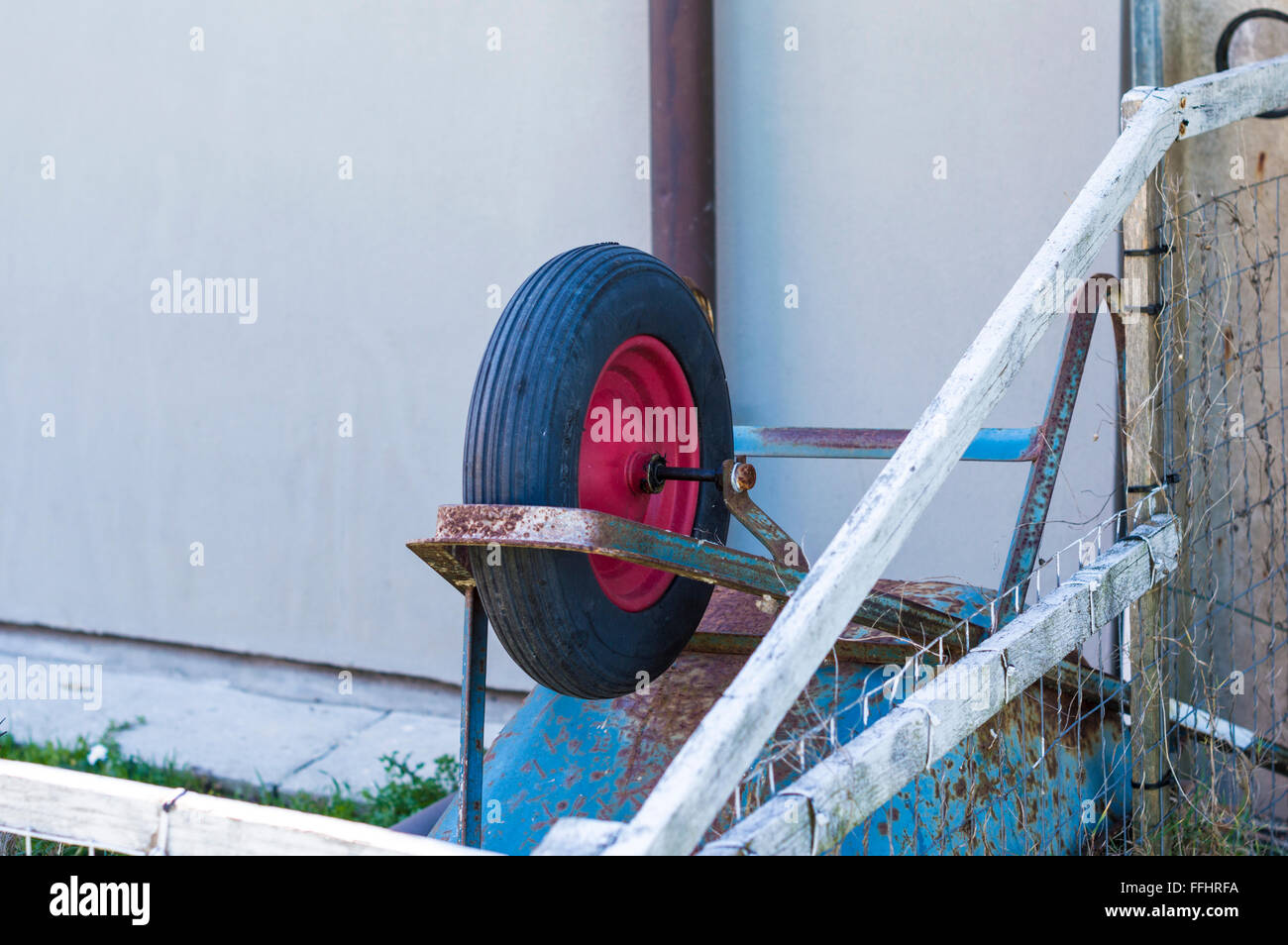 Wheel barrow overturned Stock Photo - Alamy