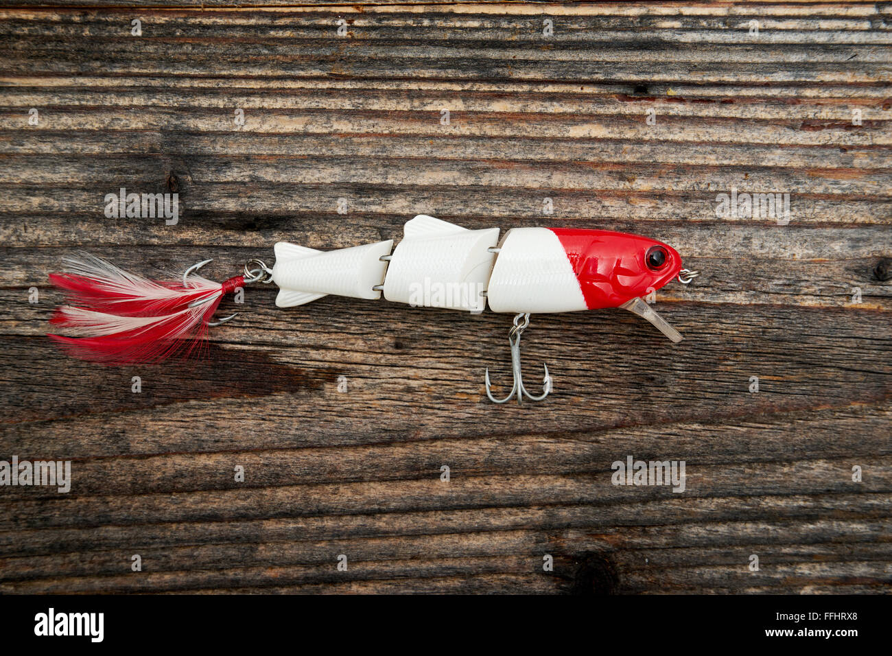 Fishing bait isolated on wooden background Stock Photo - Alamy