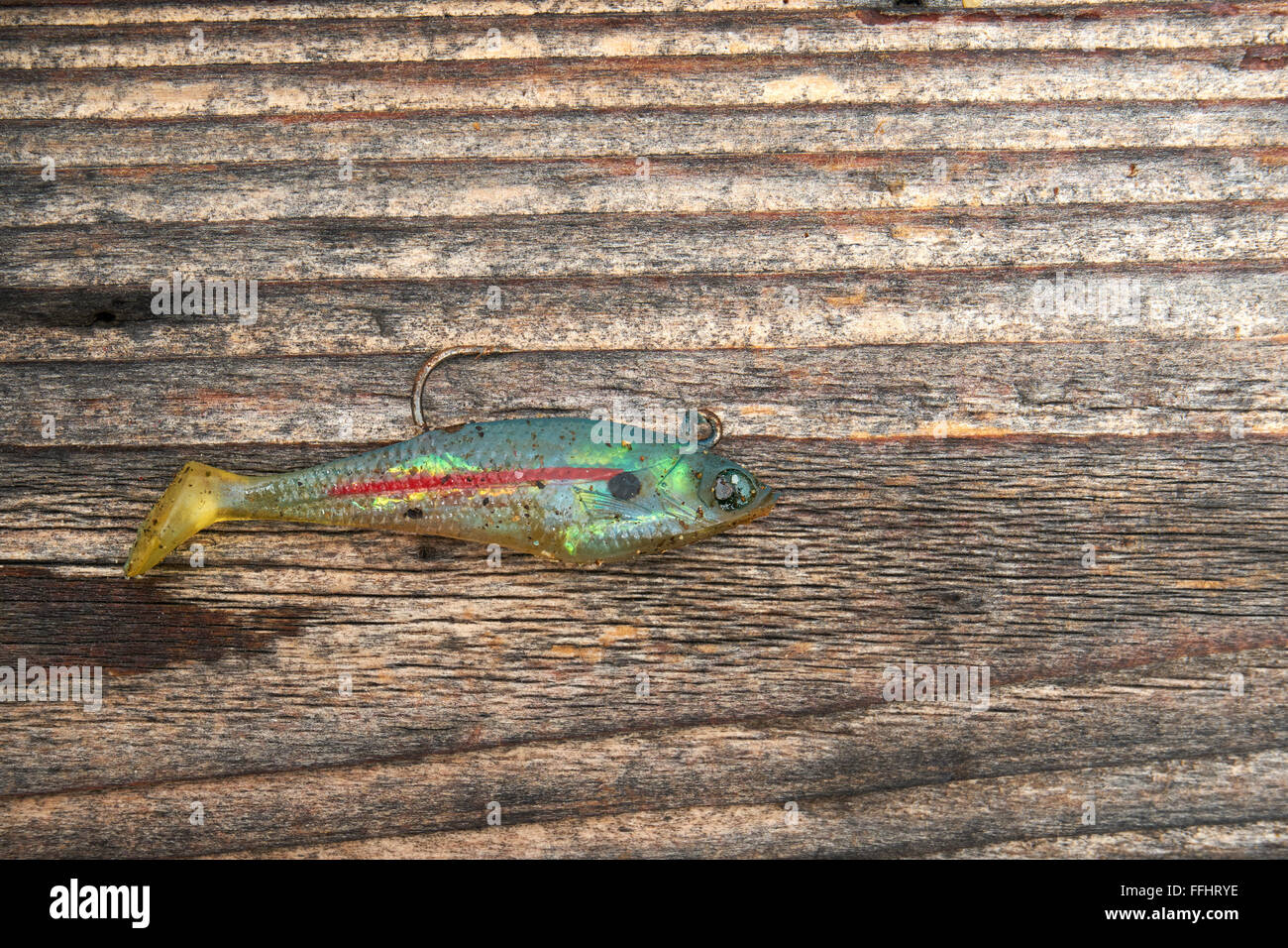 Fishing bait isolated on wooden background Stock Photo - Alamy