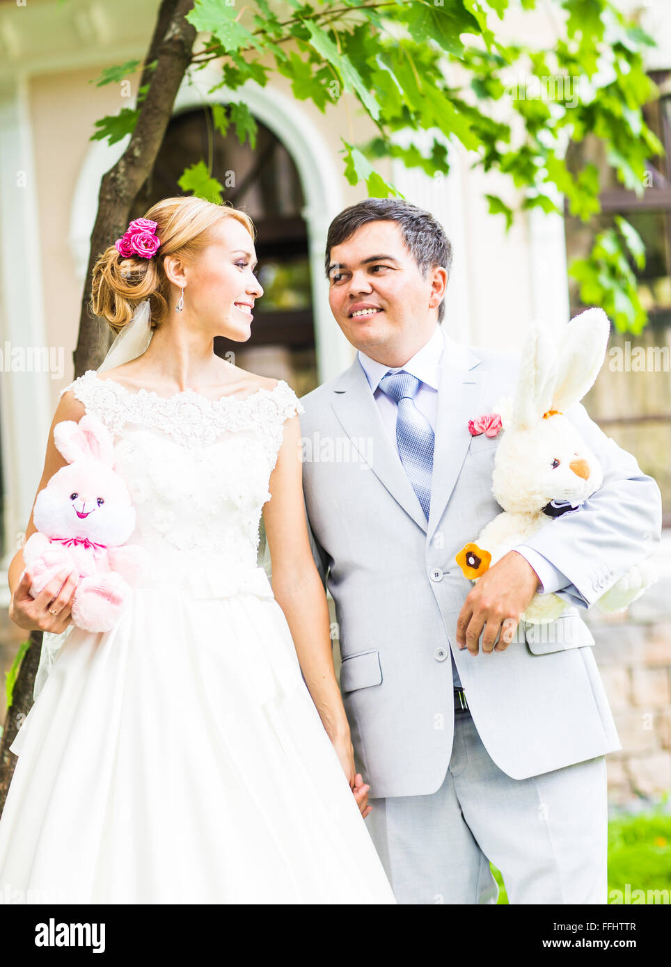 Happy bride and groom on their wedding day Stock Photo - Alamy