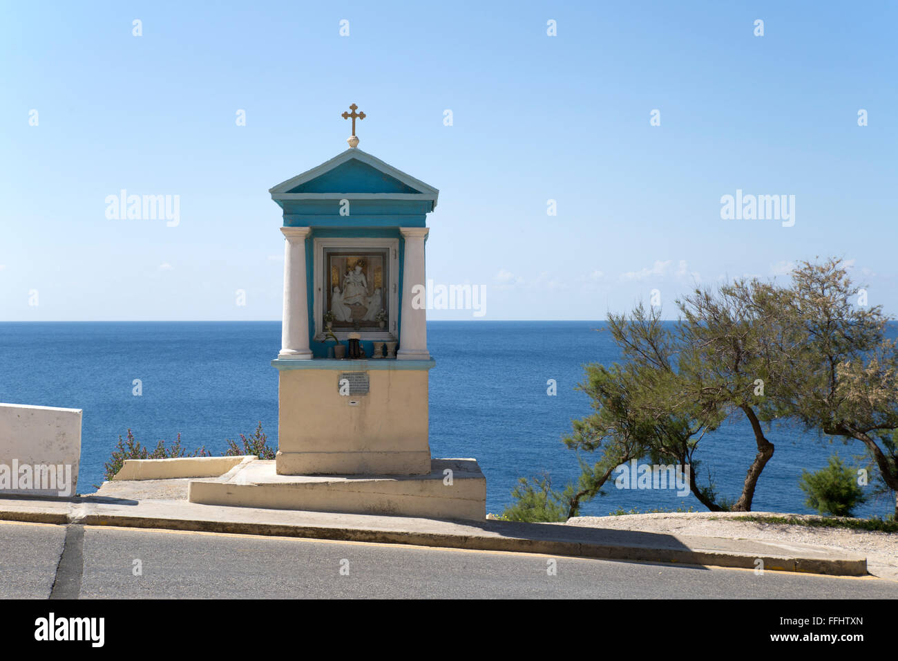 A small blue shrine on the roadside close to the coast on Malta Stock ...