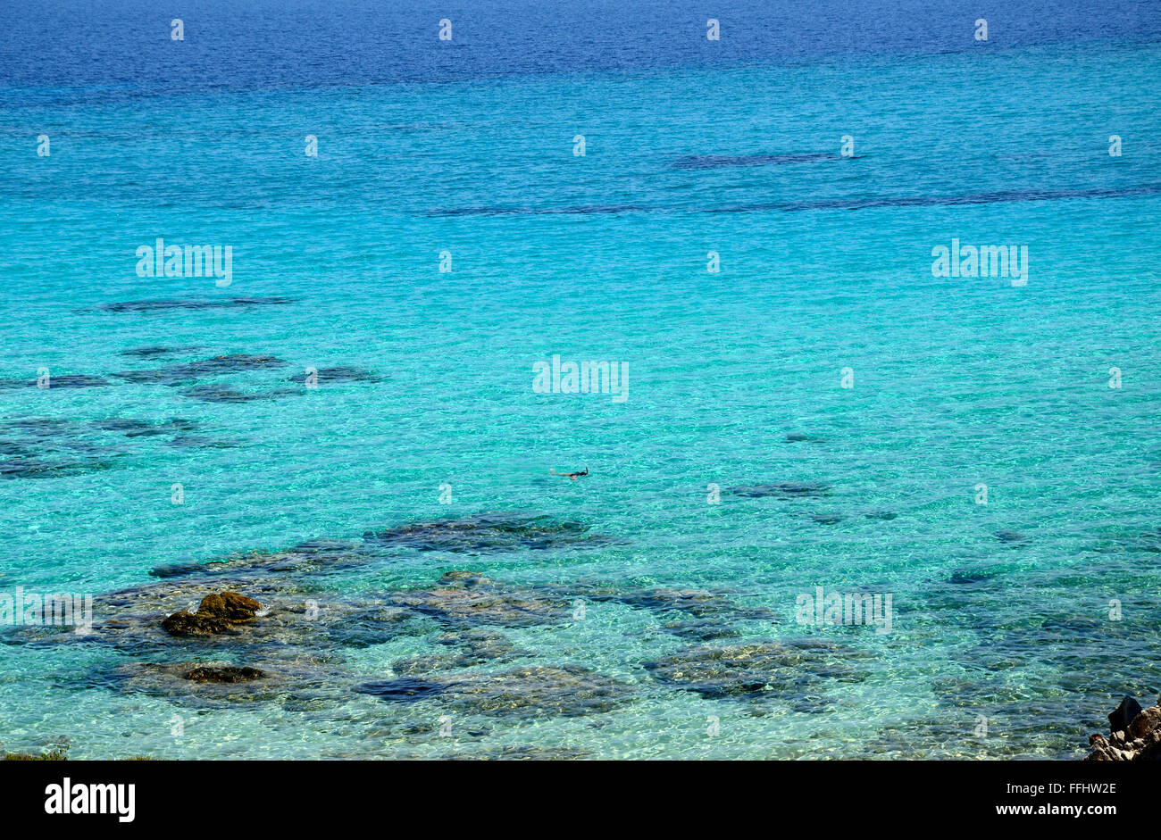 Turquoise Greek sea and some underwater rocks in vicinity of Halkidiki ...