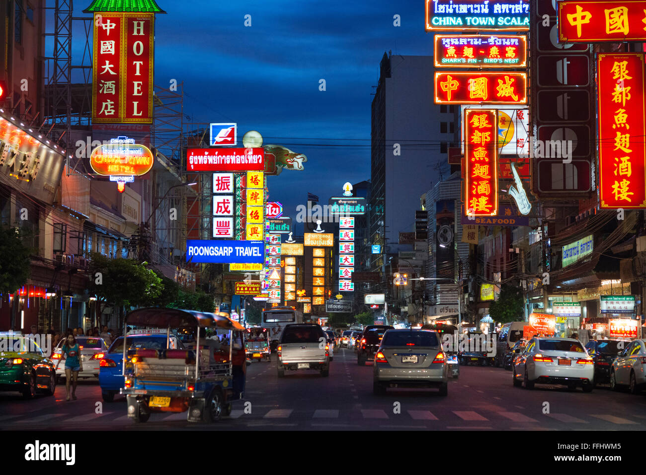 View down Thanon Yaowarat road at night in central Chinatown district of Bangkok Thailand ...
