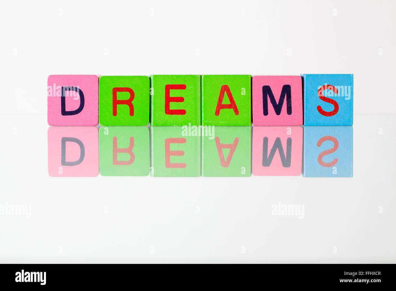 Dreams - an inscription from children's wooden blocks Stock Photo - Alamy
