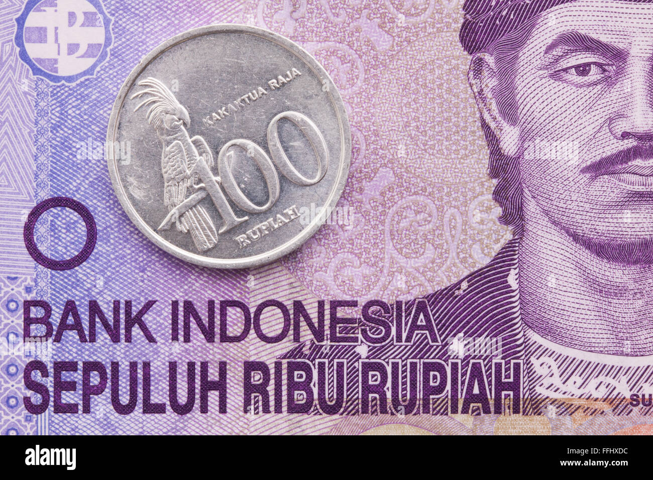 Indonesian money rupiah banknote and coins, close-up Stock Photo - Alamy
