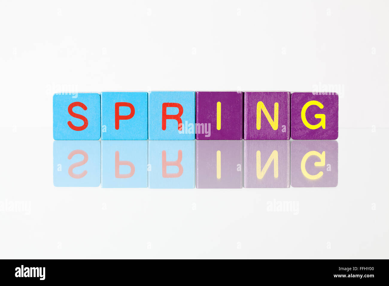Spring - an inscription from children's wooden blocks Stock Photo - Alamy