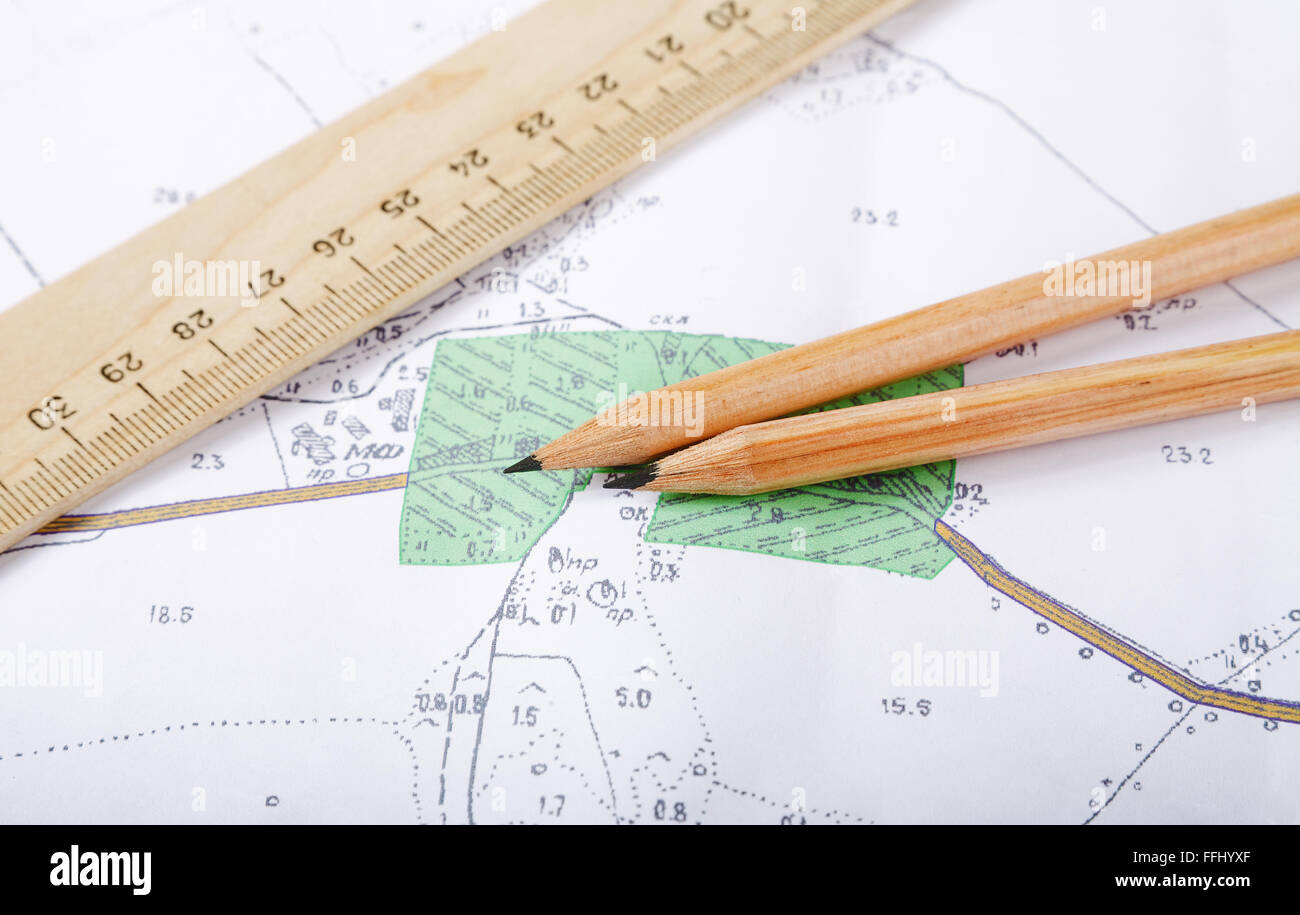 Topographic map and pencils close up Stock Photo - Alamy