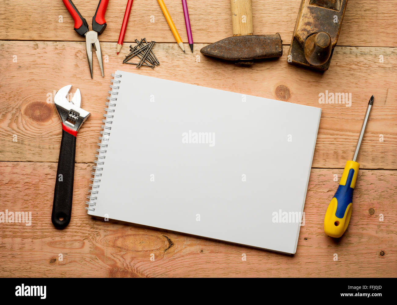 Set of tools over a wood panel with space for text Stock Photo - Alamy