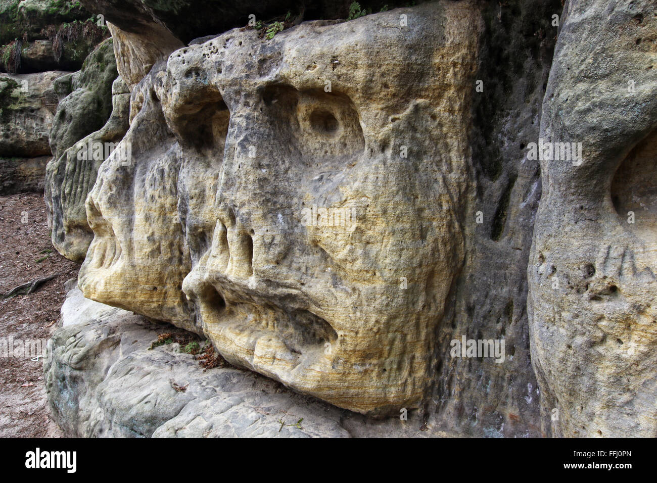 Scary Stone Heads - rock sculptures of giant heads carved into the ...