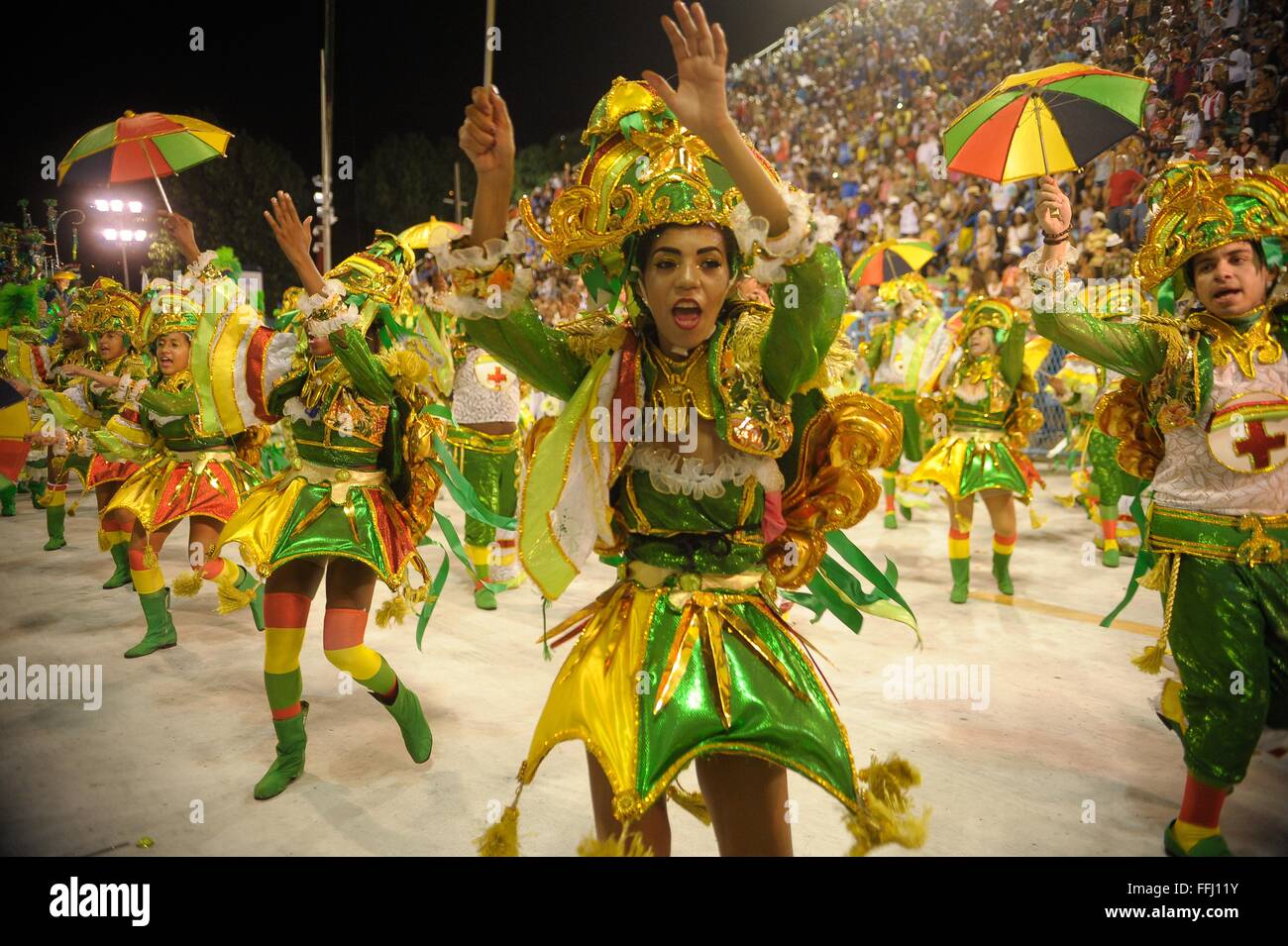 Costumed samba dancers perform in the Sambadrome during the parade of ...