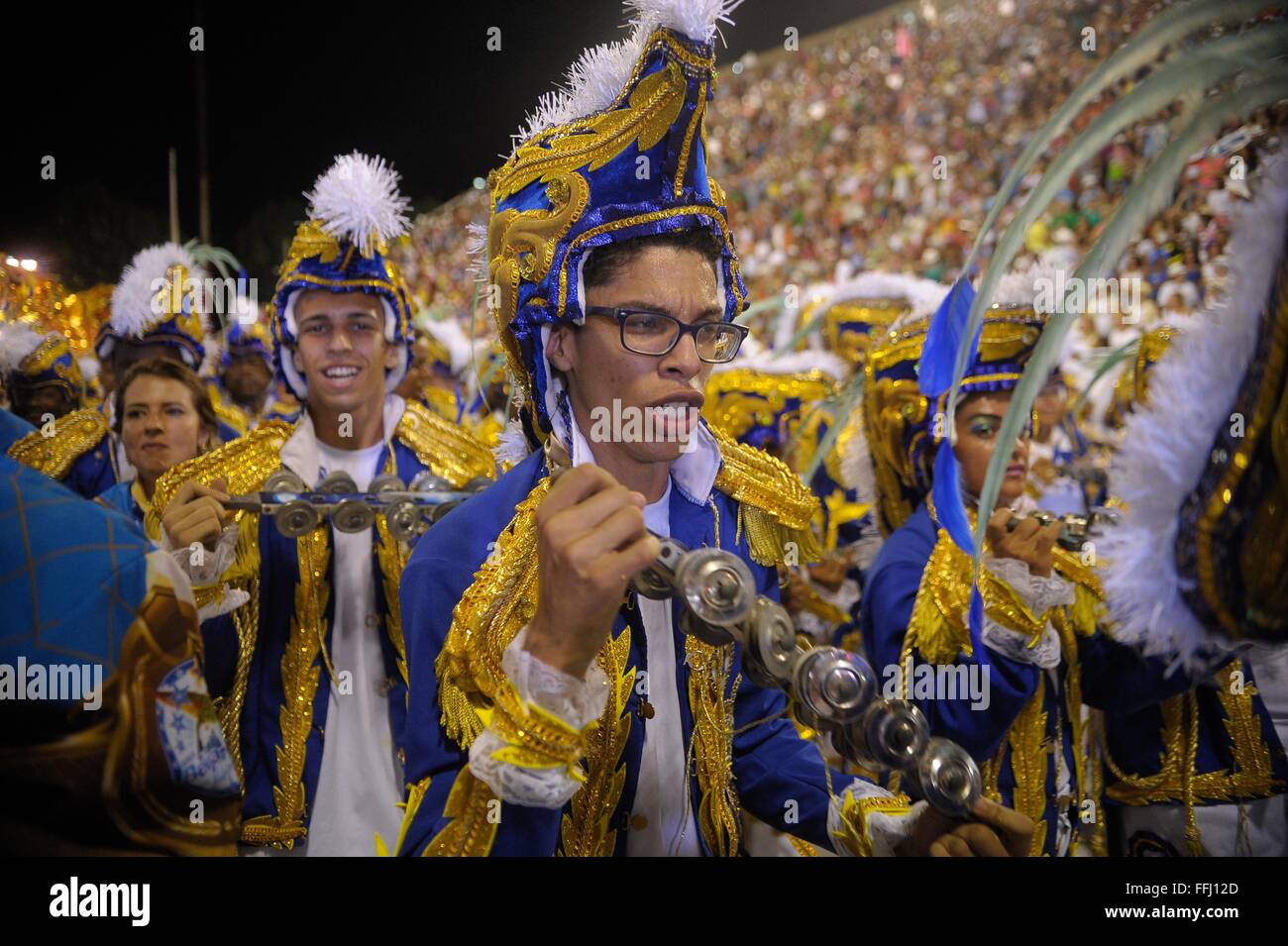 Costumed samba dancers perform in the Sambadrome during the parade of ...