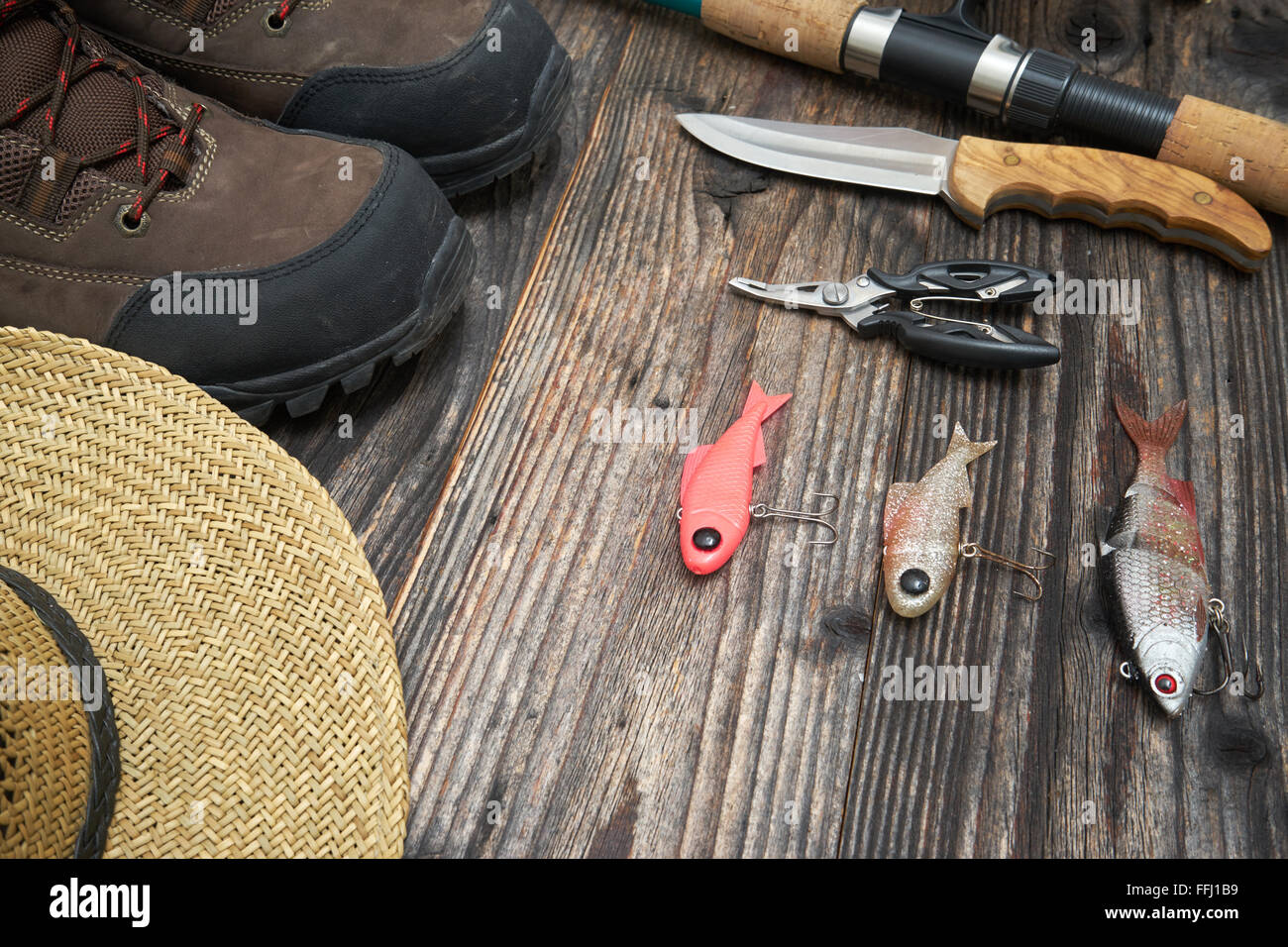 fishing tackles and fishing gear on wooden background Stock Photo - Alamy