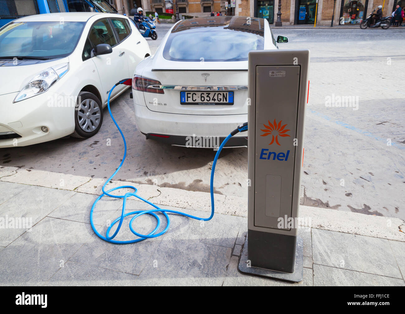 Rome, Italy - February 13, 2016 : White Tesla model S car charging at ...