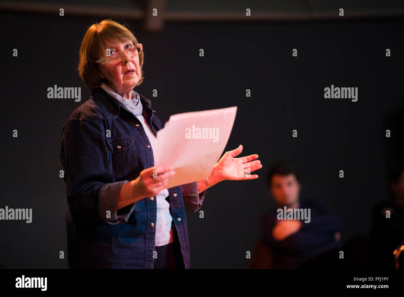A woman actor at a 'script in hand' rehearsed reading of new theatre ...