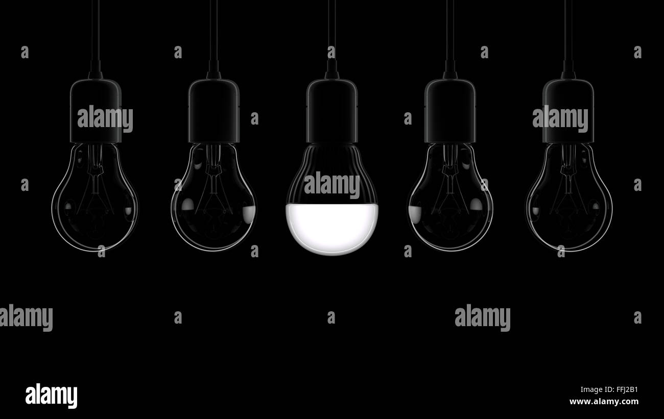 Glowing light bulb illuminating other ones on black background Stock ...