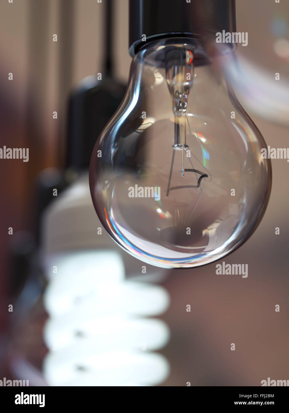 Old-fashioned incandescent light bulb among glowing energy efficient ...