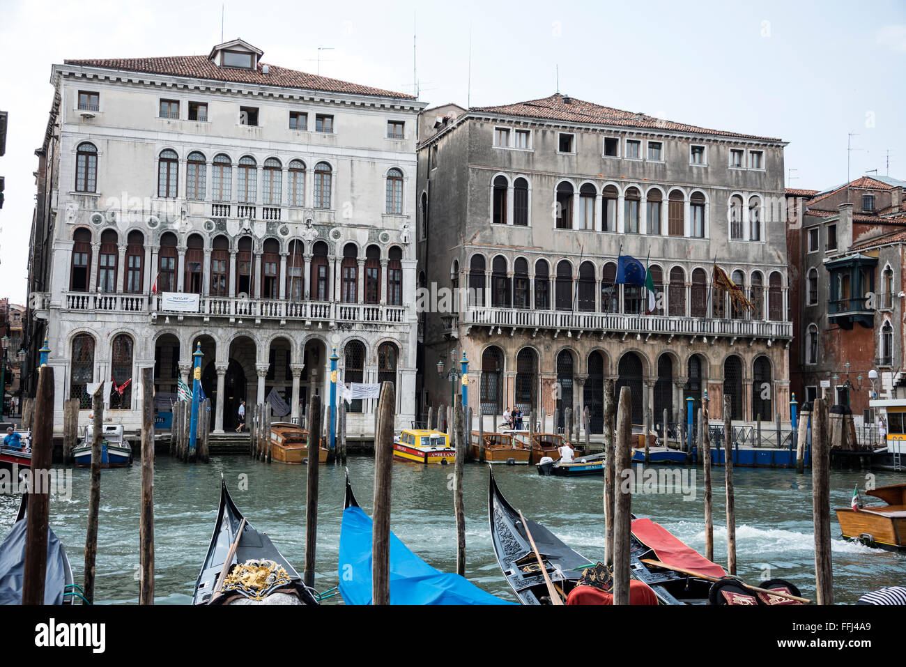 The two buildings are the Comune Di Venezia - Municipality of Venice or ...
