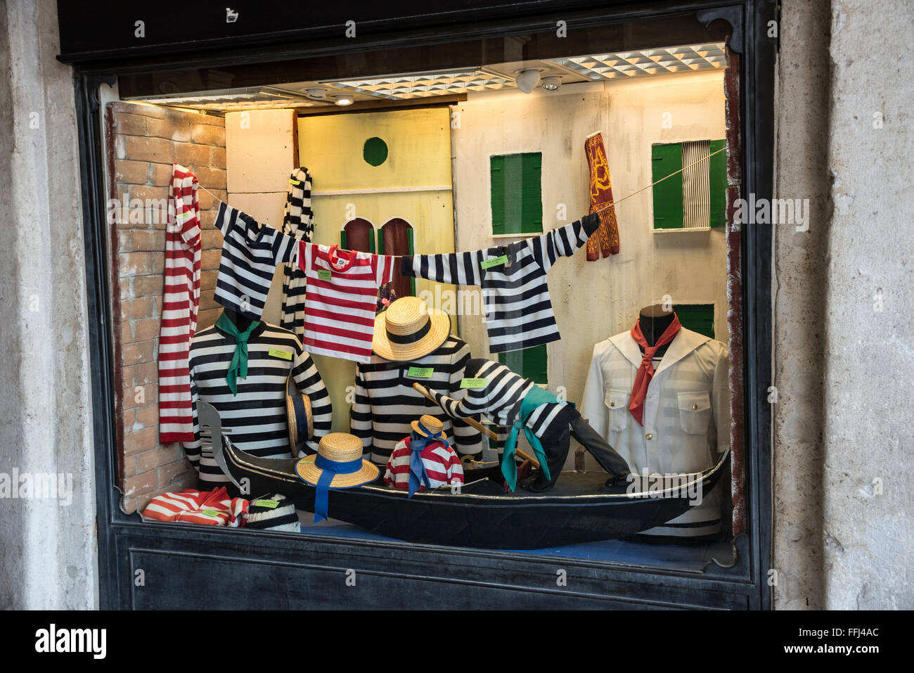 A shop window display of Gondoliere's clothing for tourists to purchase as souvenirs in Venice ...