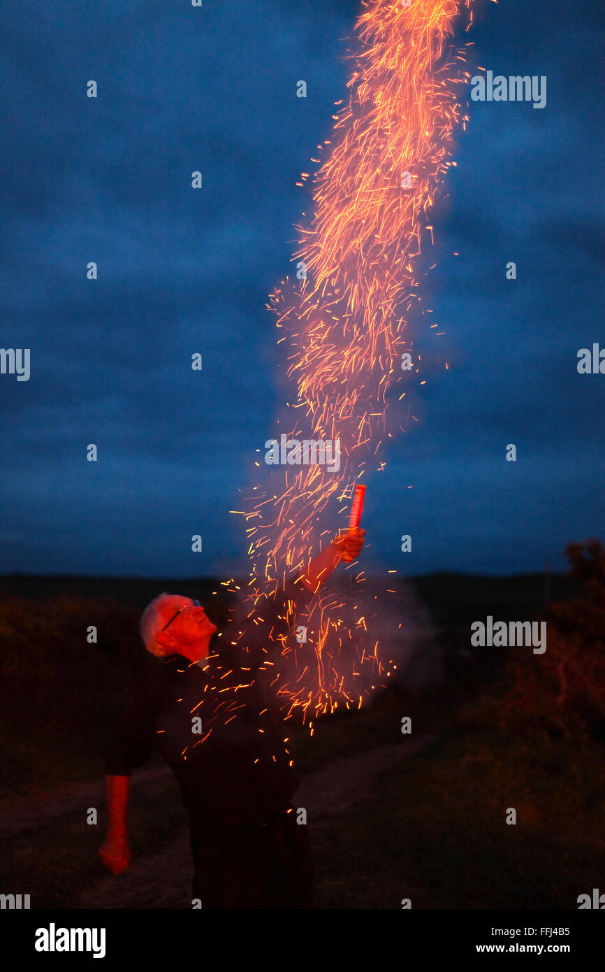 man lets off rocket Stock Photo - Alamy