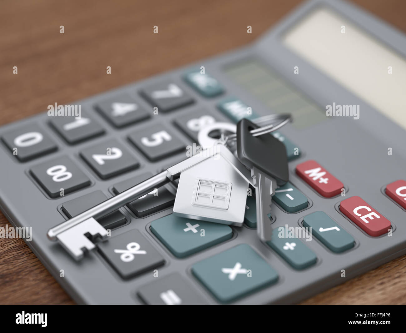 Calculator and house keys close-up Stock Photo - Alamy