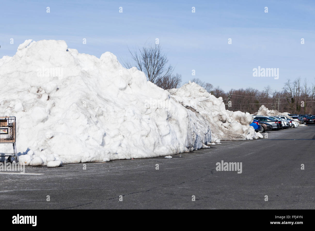 Large mound of plowed snow in shopping center parking lot - Virginia ...
