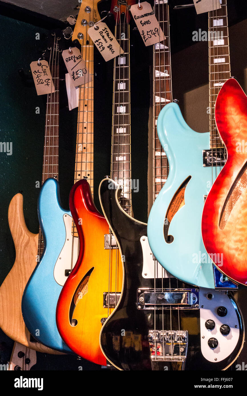 Electric guitars on display in a music shop Stock Photo - Alamy