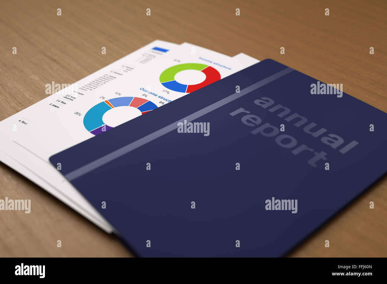 Annual Report in plastic folder, some figures are visible. Shallow DoF ...