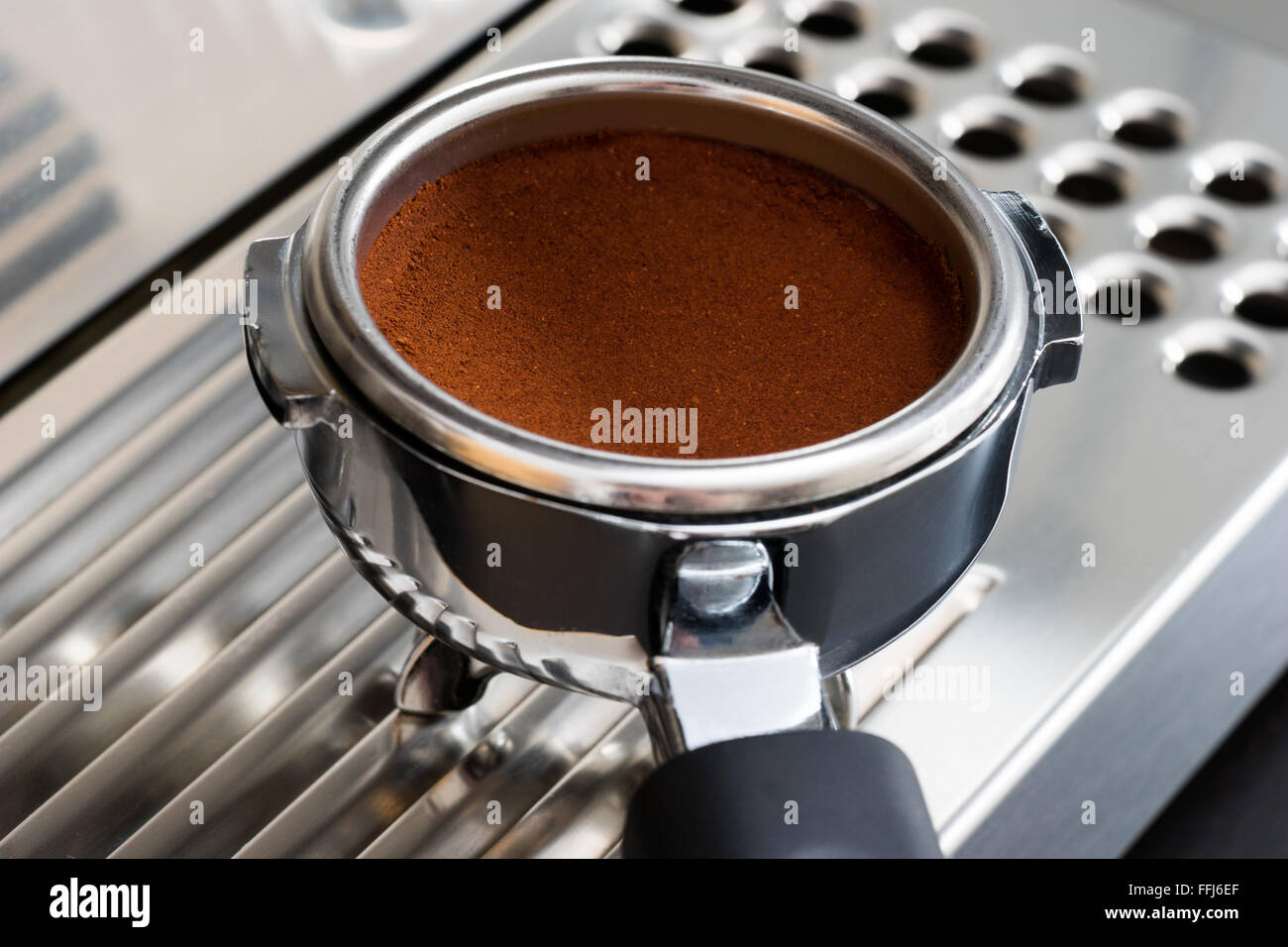 The portafilter coffee, close-up Stock Photo - Alamy
