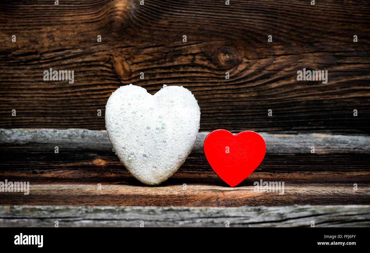 White Heart With Drops Of Rain And Red Wooden Heart On Old Wooden Board ...