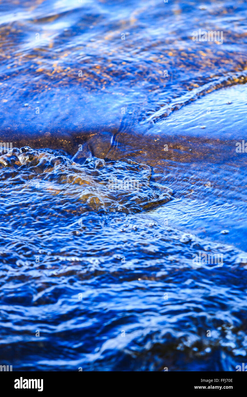 Blue wave in the ocean Stock Photo - Alamy