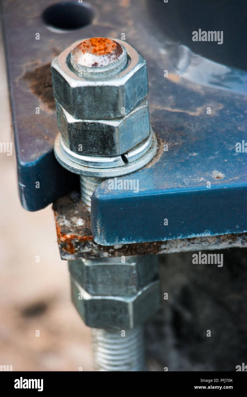 Large bolt and nut screwed on construction Stock Photo - Alamy