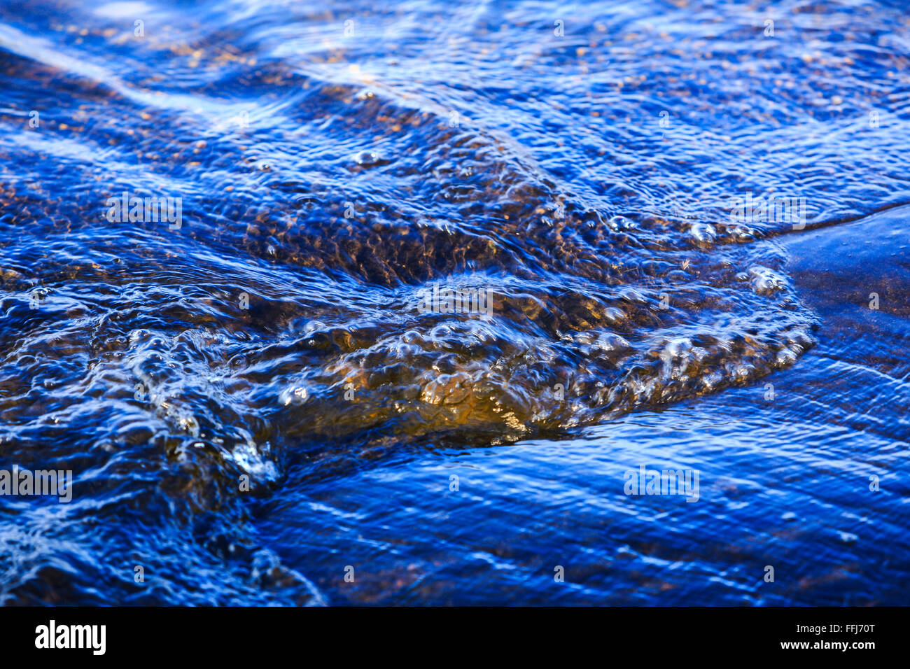 Blue wave in the ocean Stock Photo - Alamy